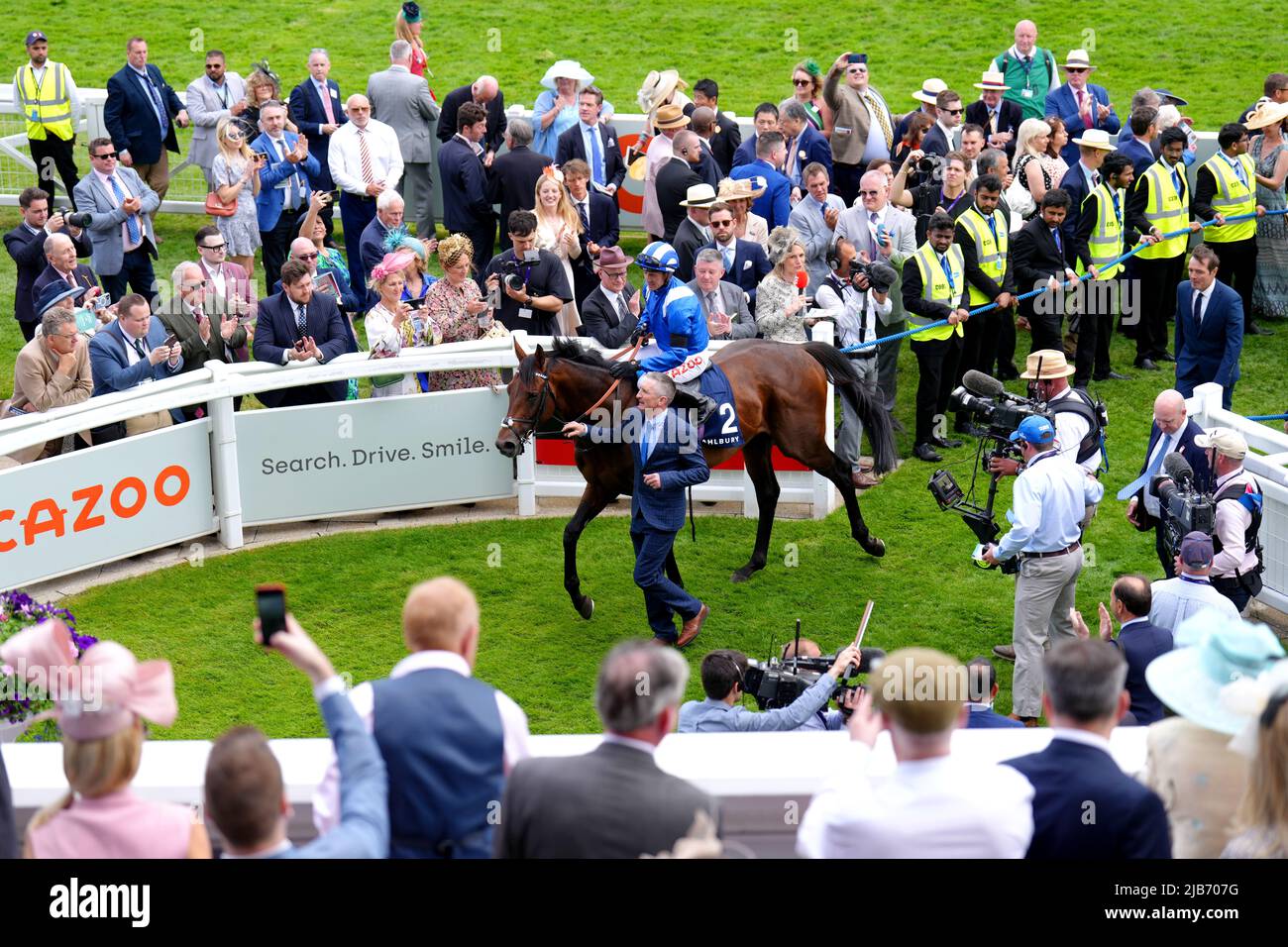 Hukum ridden by jockey Jim Crowley is lead into the winners enclosure ...