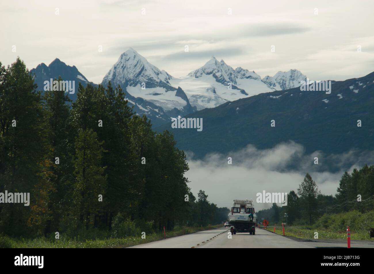 A fishing boat being towed on highway, Valdez,Alaska Stock Photo - Alamy