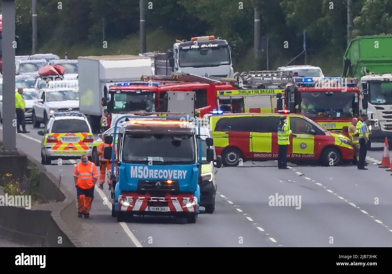 Emergency service personnel along with forensic collision investigators ...