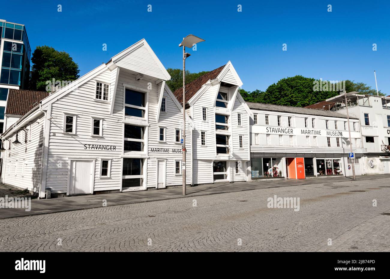 Scenic wooden building of Stavanger Maritime Museum in a city port ...
