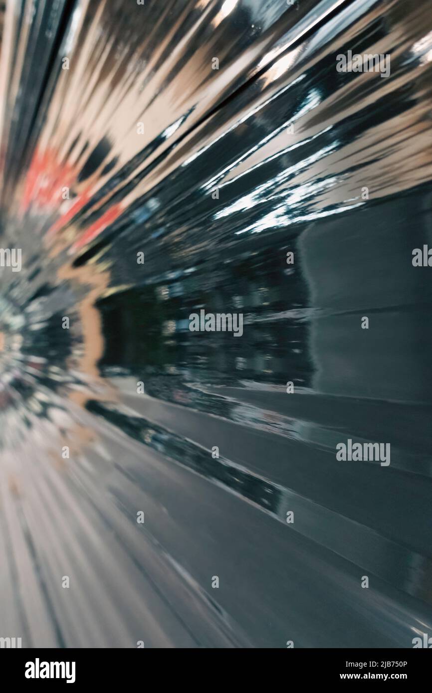 Black crumpled wrinkled plastic wrap cellophane background. Reflecting ...