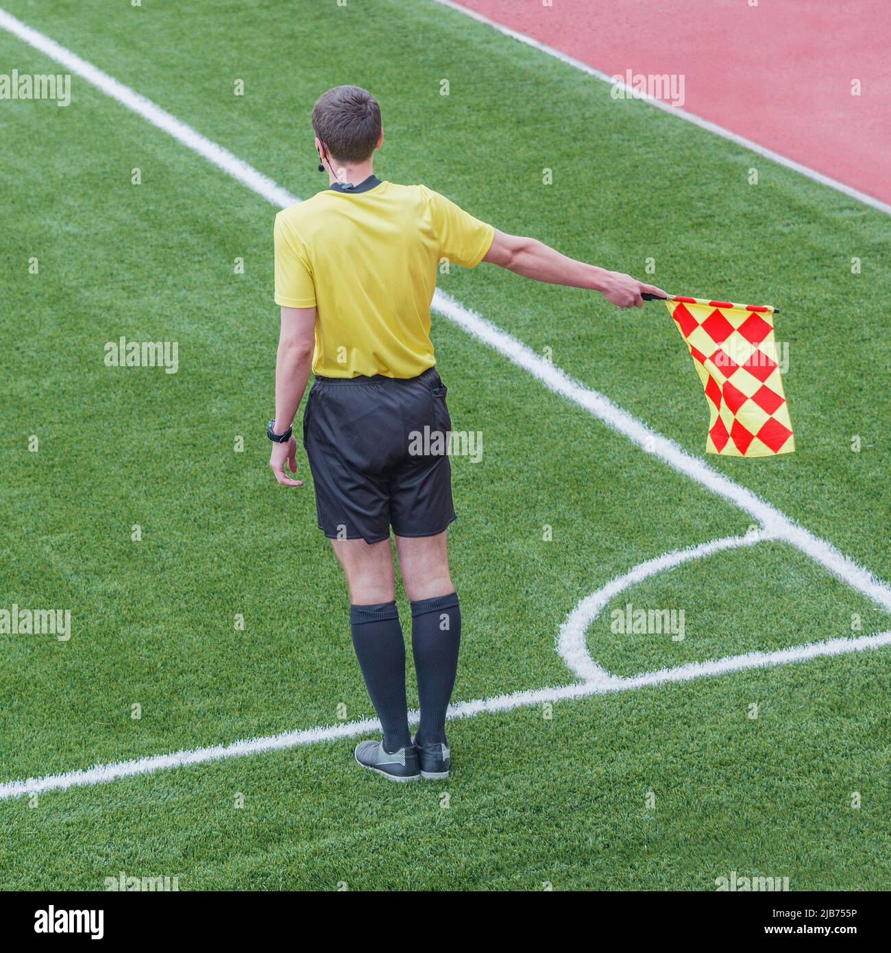Referee from the sidelines of a soccer game Stock Photo - Alamy