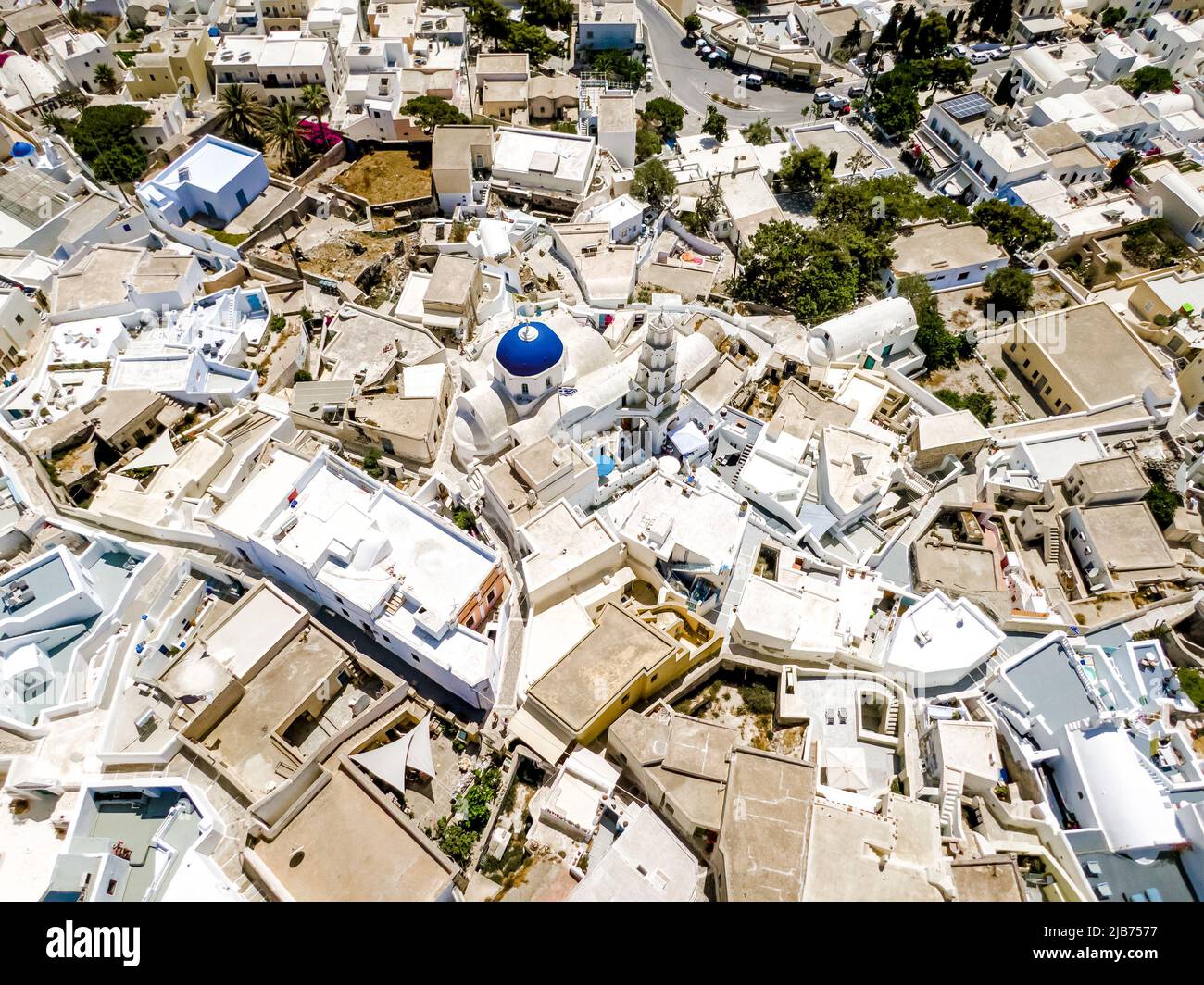 Top view of classic Greek architecture - white houses under the hot sun ...