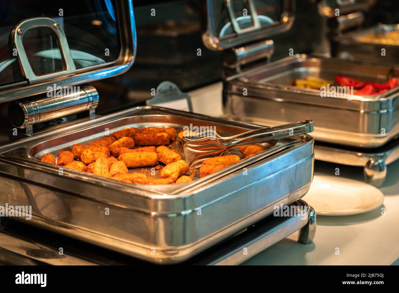 All-inclusive buffet food in heating trays in hotel restaurant Stock ...