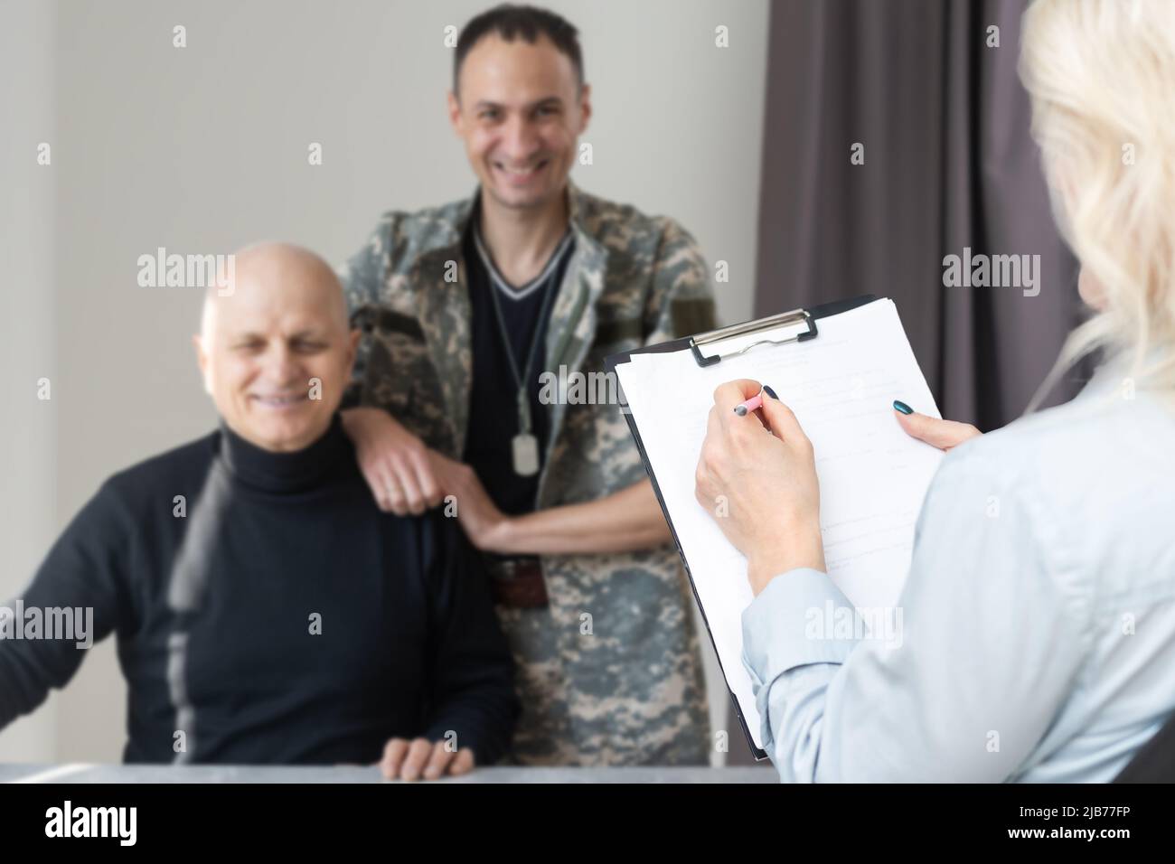 Close up of psychologist analyzing military patient behaviour Stock ...