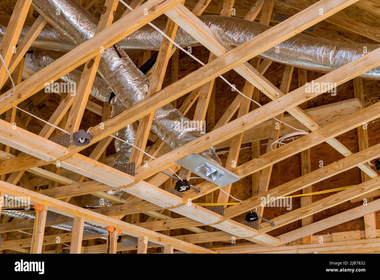 Ventilation pipes in silver insulation material on the whole house air ...
