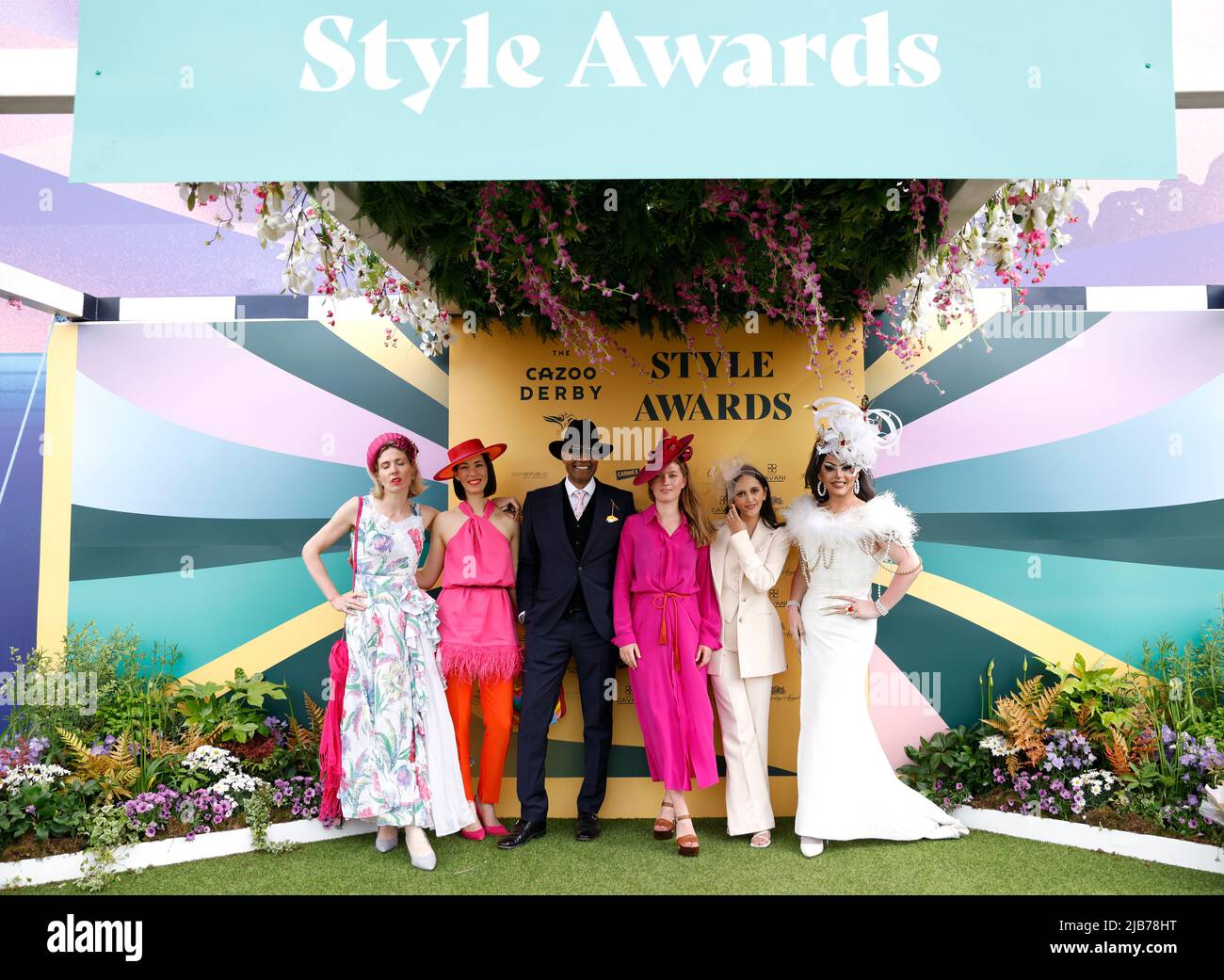 Cara Lahnstein (centre right) poses for photographers after winning the ...