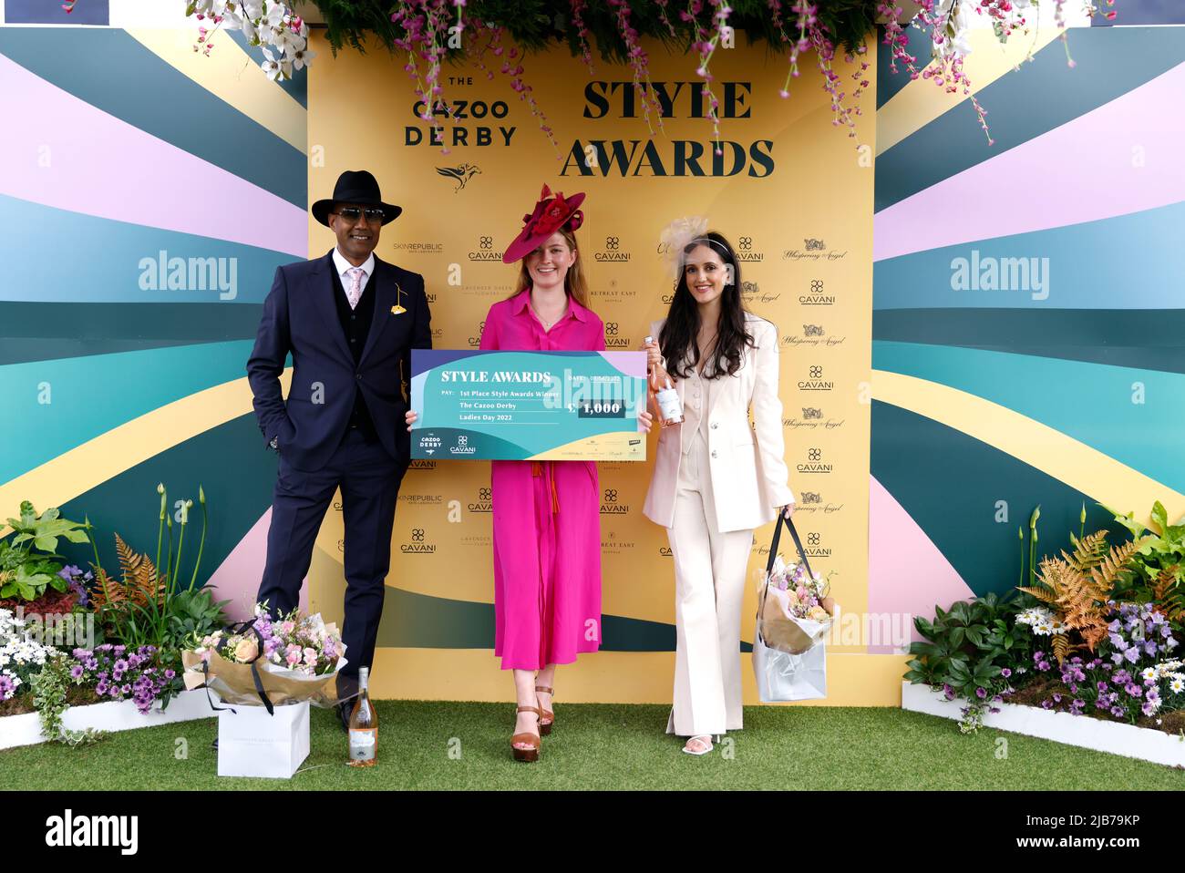 Cara Lahnstein (centre) poses for photographers after winning the Cazoo ...