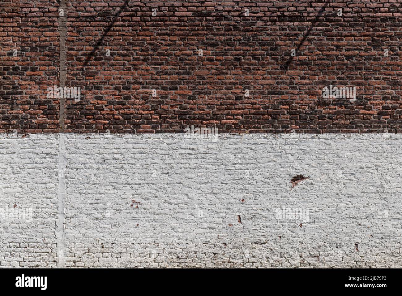 Two tone historic red and white brick wall horizontal Stock Photo - Alamy
