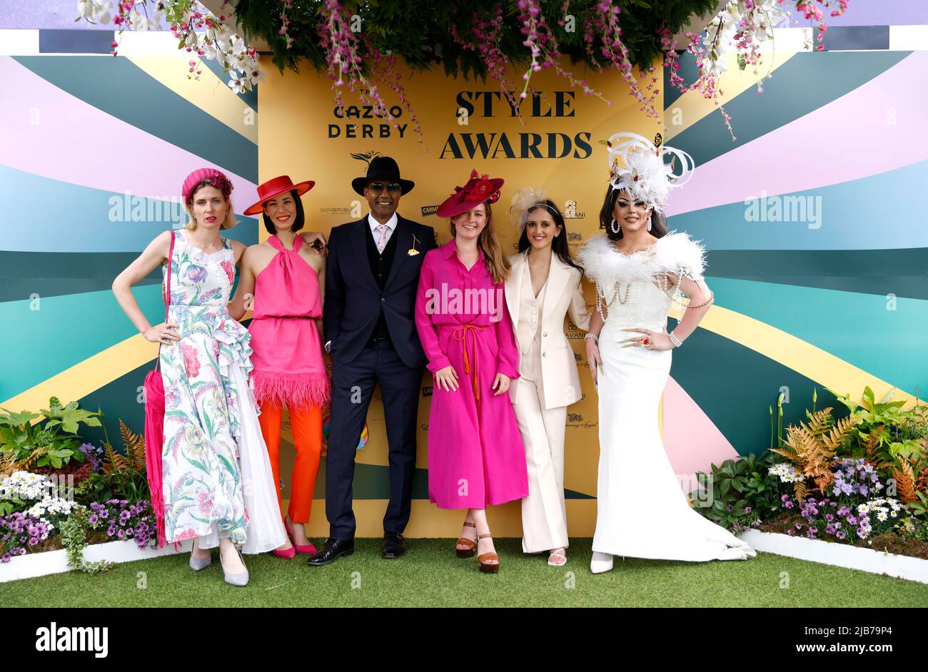 Cara Lahnstein (centre right) poses for photographers after winning the ...
