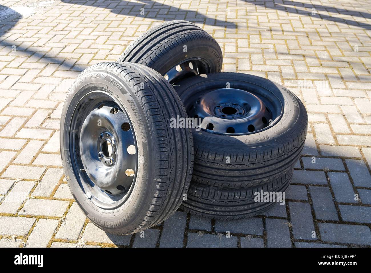 Moscow. Russia. February 27, 2022. New set of summer tires stacked on ...