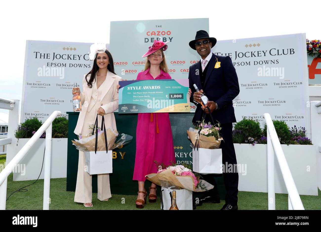 Cara Lahnstein (centre) poses for photographers after winning the Cazoo ...