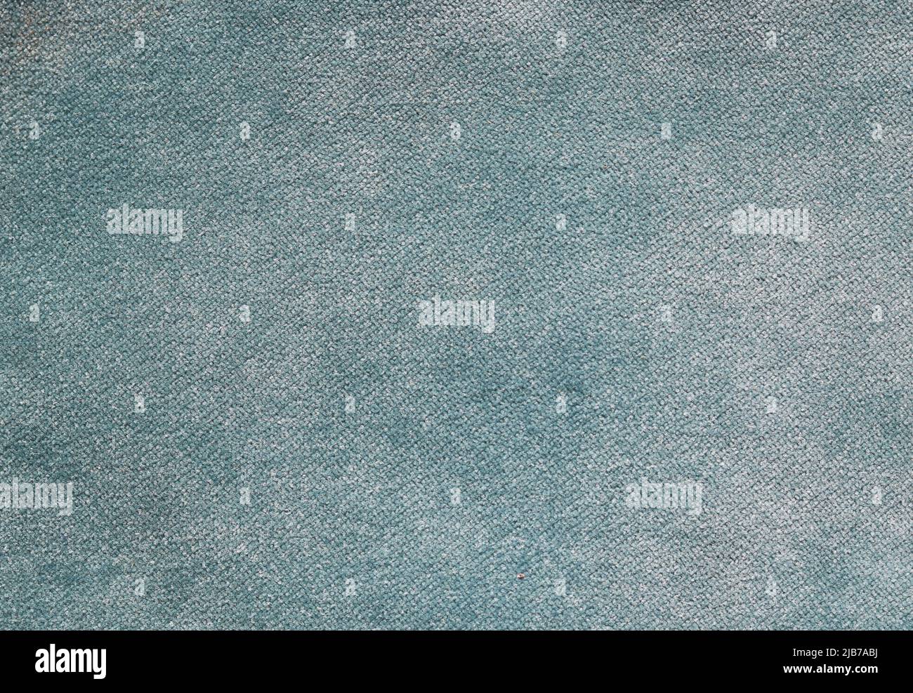 Full frame pale blue grey textured velvet fabric with space for copy ...