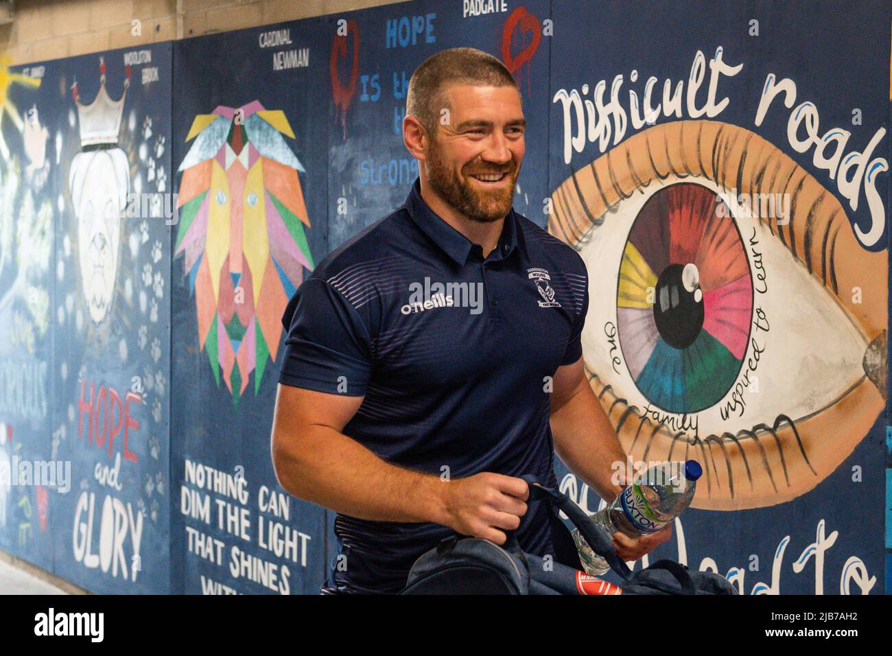 Kyle Amor #32 of Warrington Wolves arrives at the Halliwell Jones ...