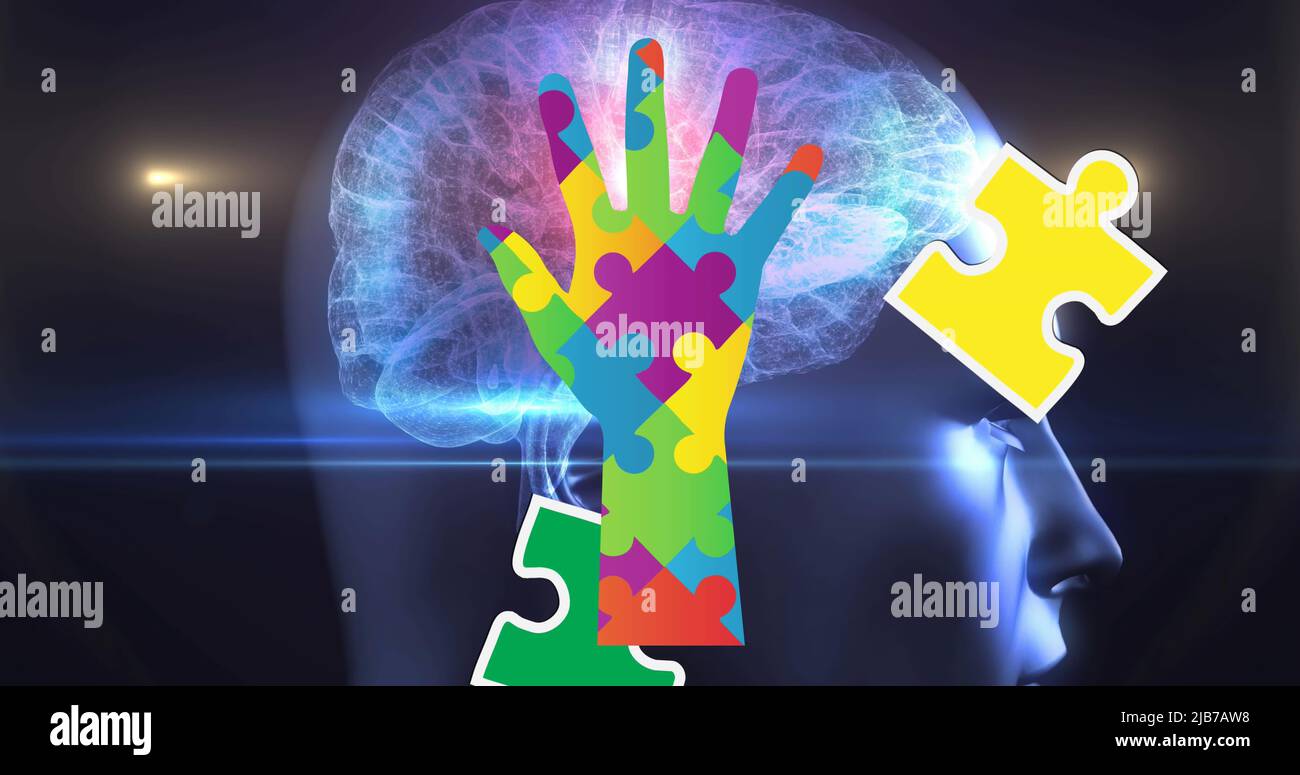 Image of colourful puzzle pieces autism awareness month hand over human ...