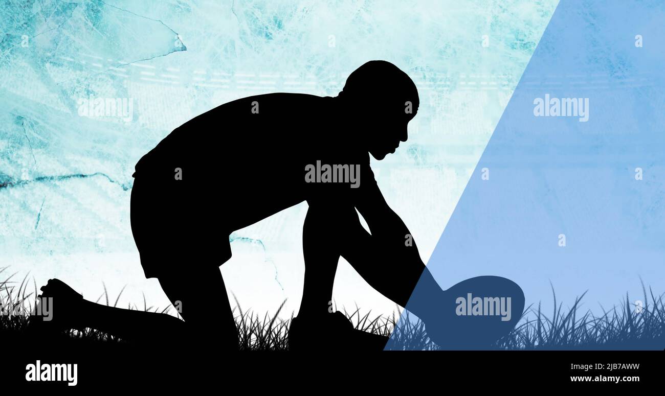 Image of diagonal blue stripe moving over silhouetted male rugby player ...
