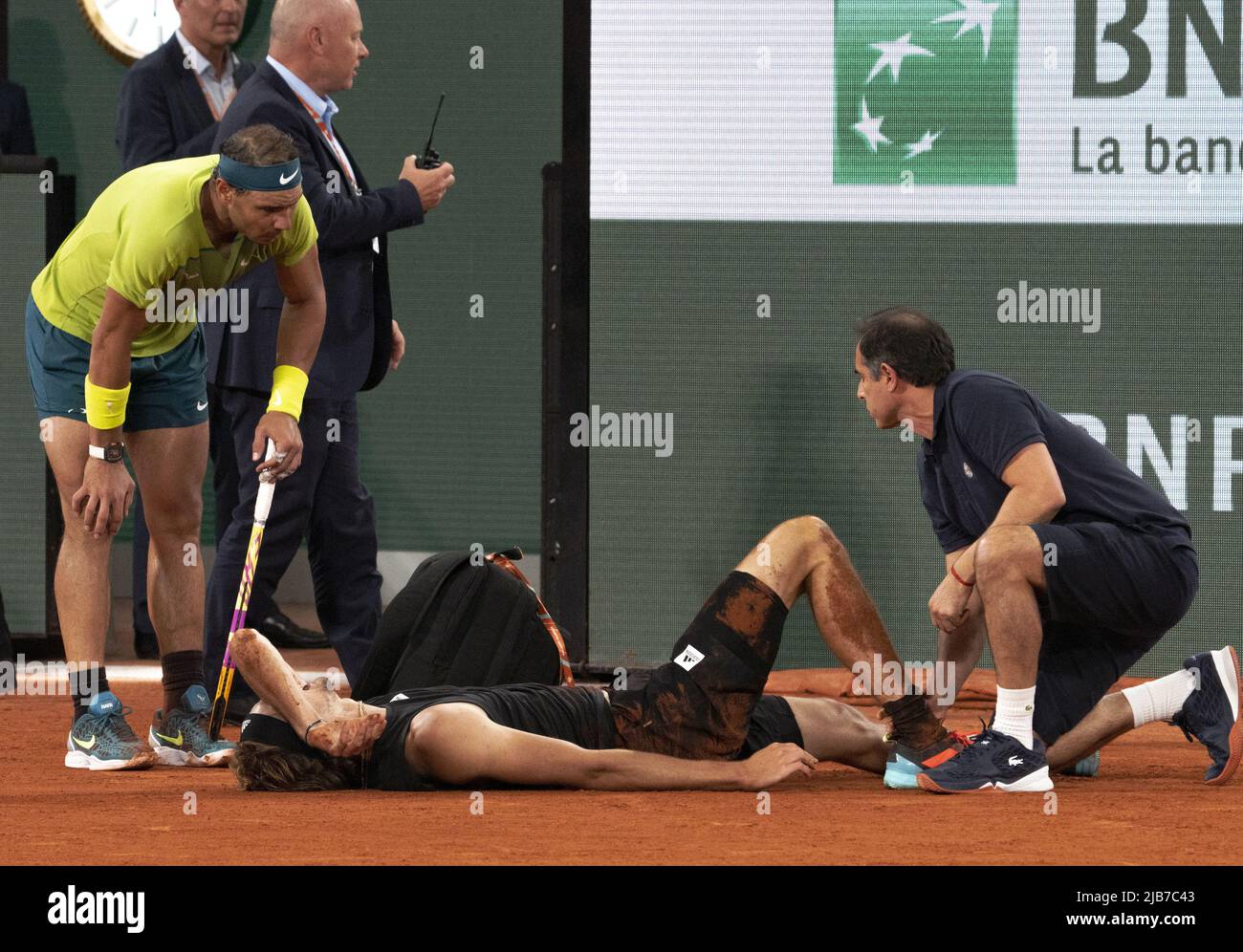 Paris, France. 03rd June, 2022. Third seeded Alexander Zverev of Germany lies in pain on the ...