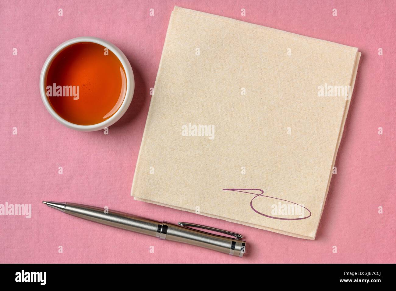 stylized sketch of infinity symbol on a napkin with a cup of tea, copy ...