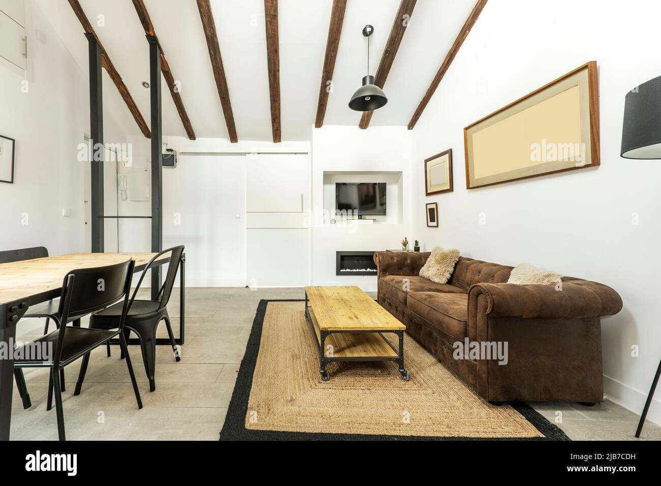 loft with high ceilings, updated vintage wood beams, industrial wood ...