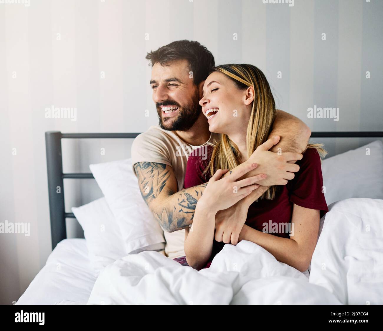 couple love bedroom bed lying romance happy relationship valentine day ...