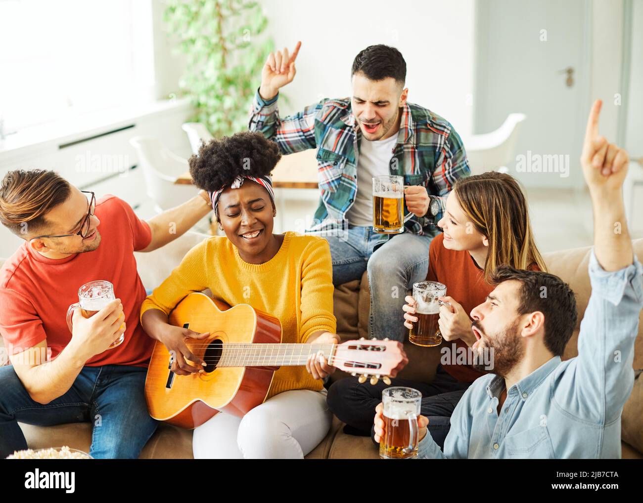 girl boy couple party guitar playing music drinking beer bottle fun ...