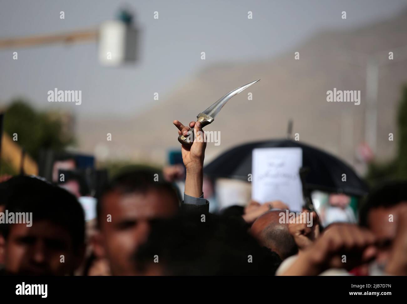 Sanaa, Yemen. 03rd June, 2022. A houthi supporter holds a dagger during ...