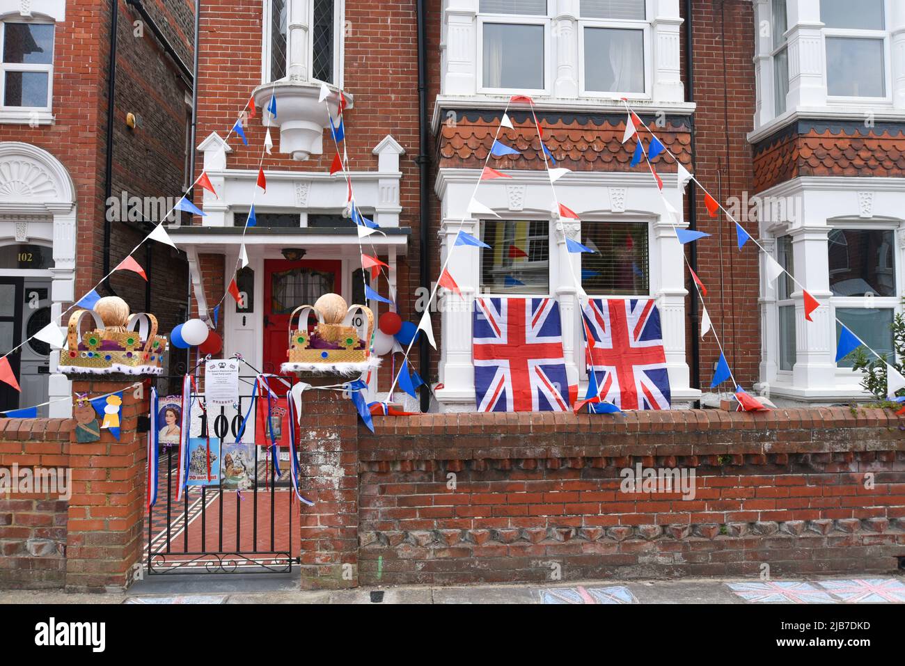 English building with flag and banners to celebrate the Platinum ...