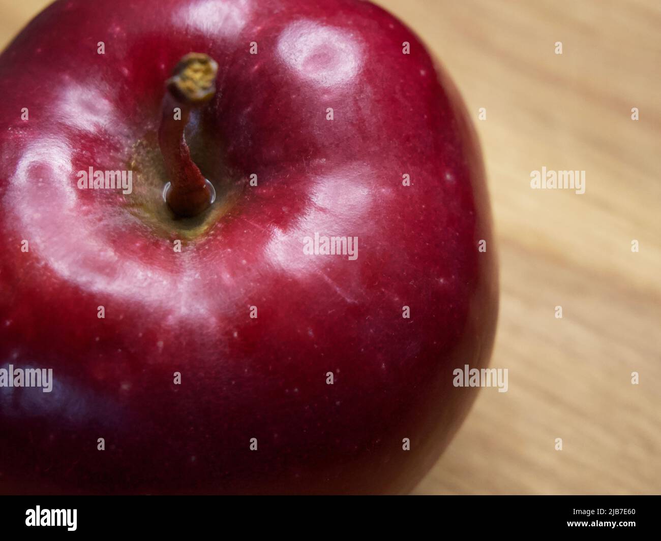 One big red apple. A macro shot of an apple of the Red Chief variety ...