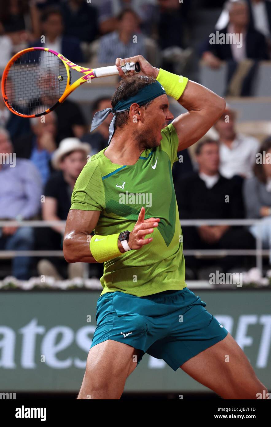 Paris, France. 03rd June, 2022. Fifth-seeded Rafael Nadal of Spain returns the ball to third ...