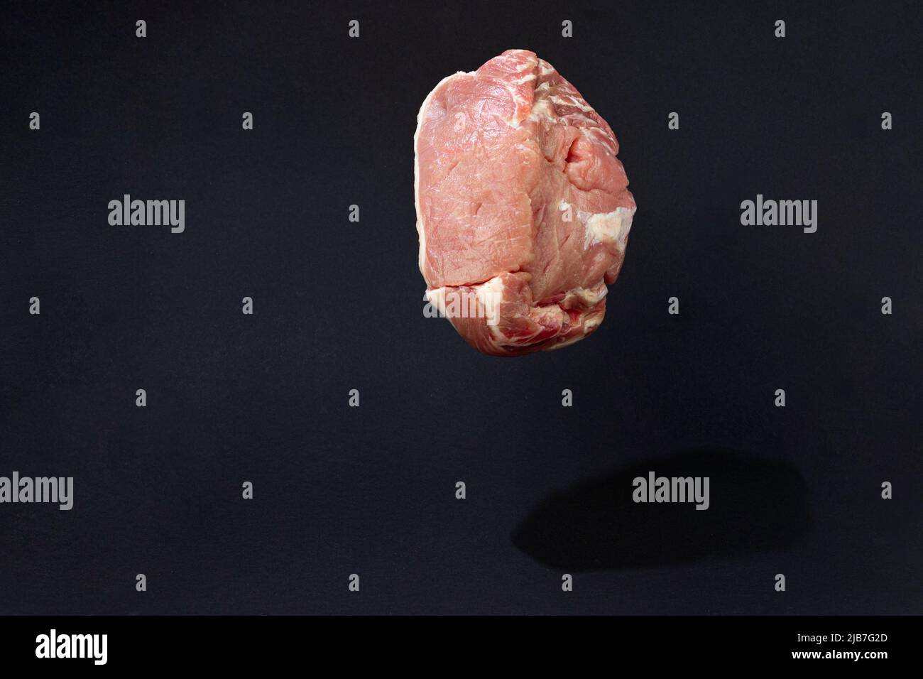 Fresh meat on dark background, Levitation Raw beef steak and spices for ...
