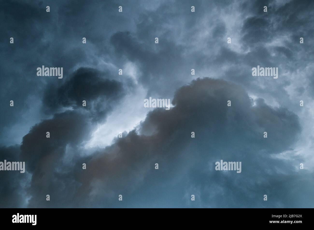 A Blue Thunder Cloud before a Storm Stock Photo - Alamy