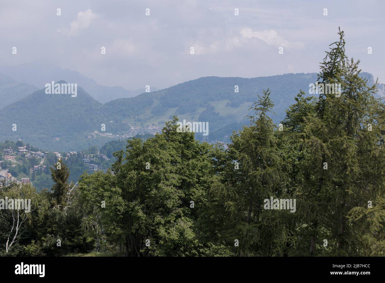small town in the alps mountains of italy Stock Photo - Alamy