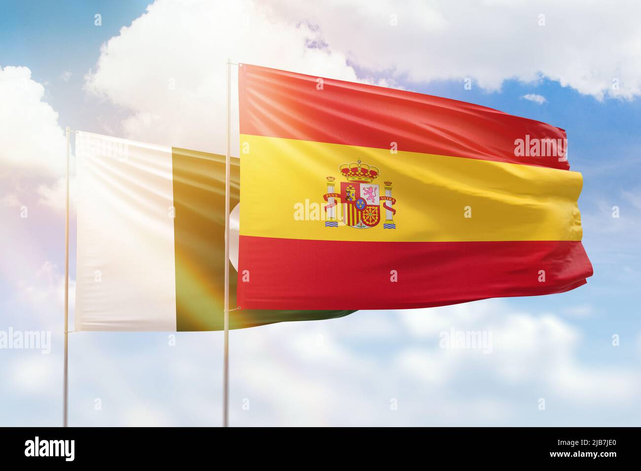 Sunny blue sky and flags of spain and pakistan Stock Photo - Alamy