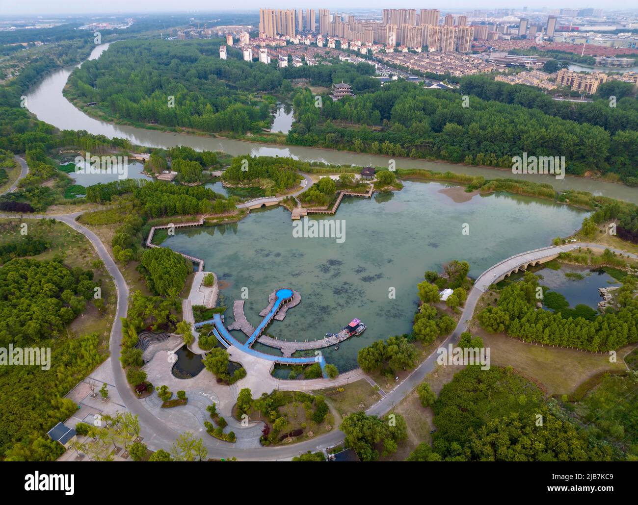 HUAI'AN, CHINA - JUNE 1, 2022 - Trees cover the ancient Huai River ...