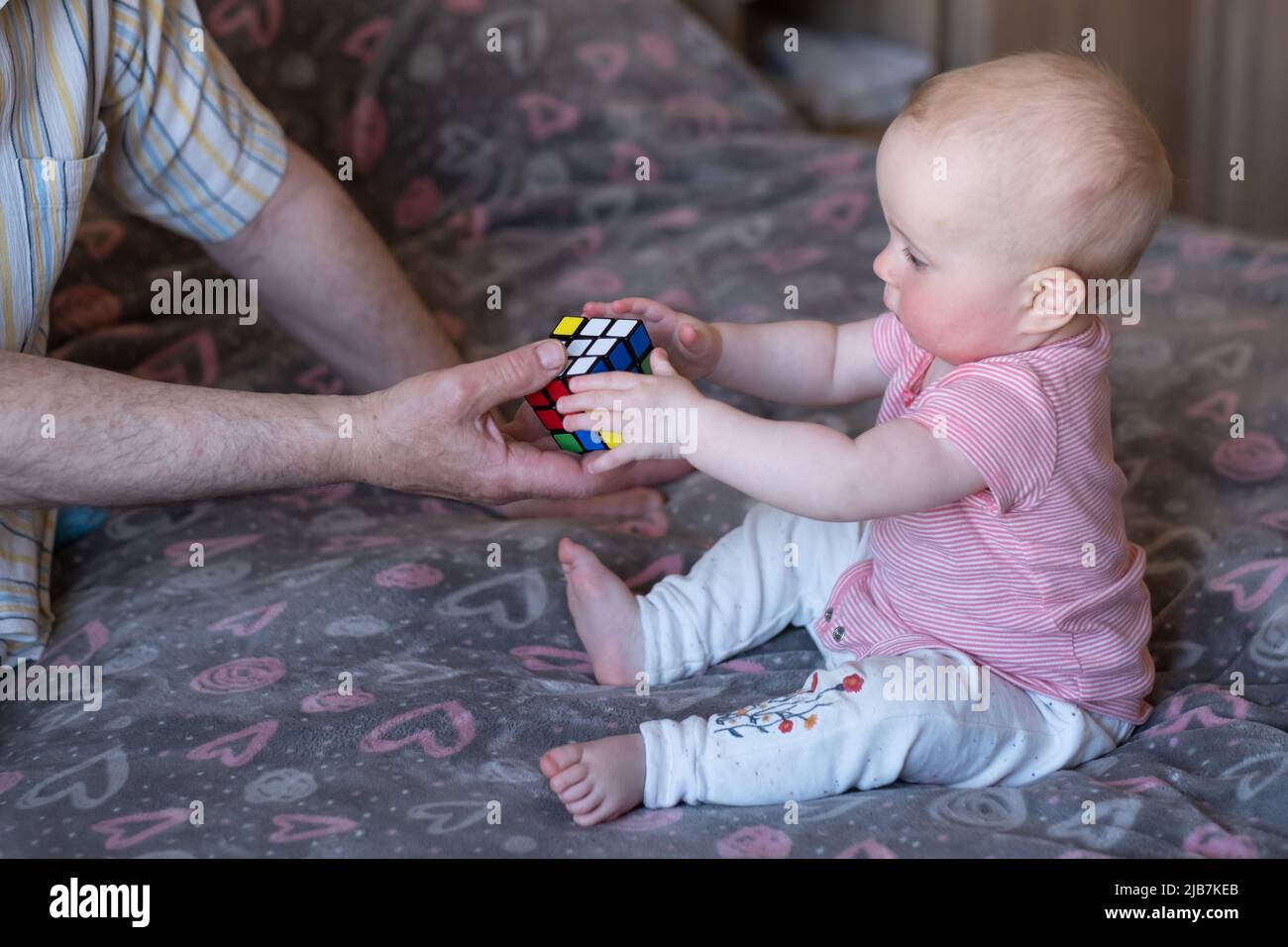 Kirovsk, Russia, May 29 2022: Caucasian grandfather and baby girl ...