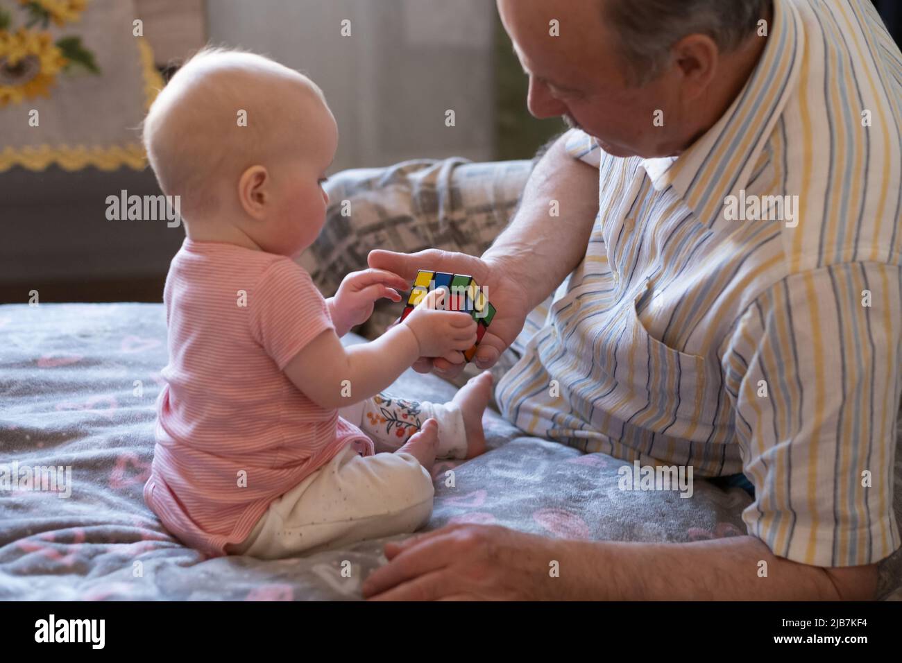 Kirovsk, Russia, May 29 2022: Caucasian grandfather and baby girl ...