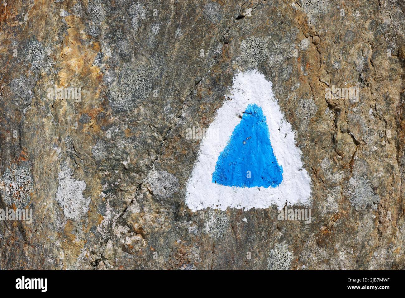 Hiking trail signs symbols painted on a rock Stock Photo - Alamy