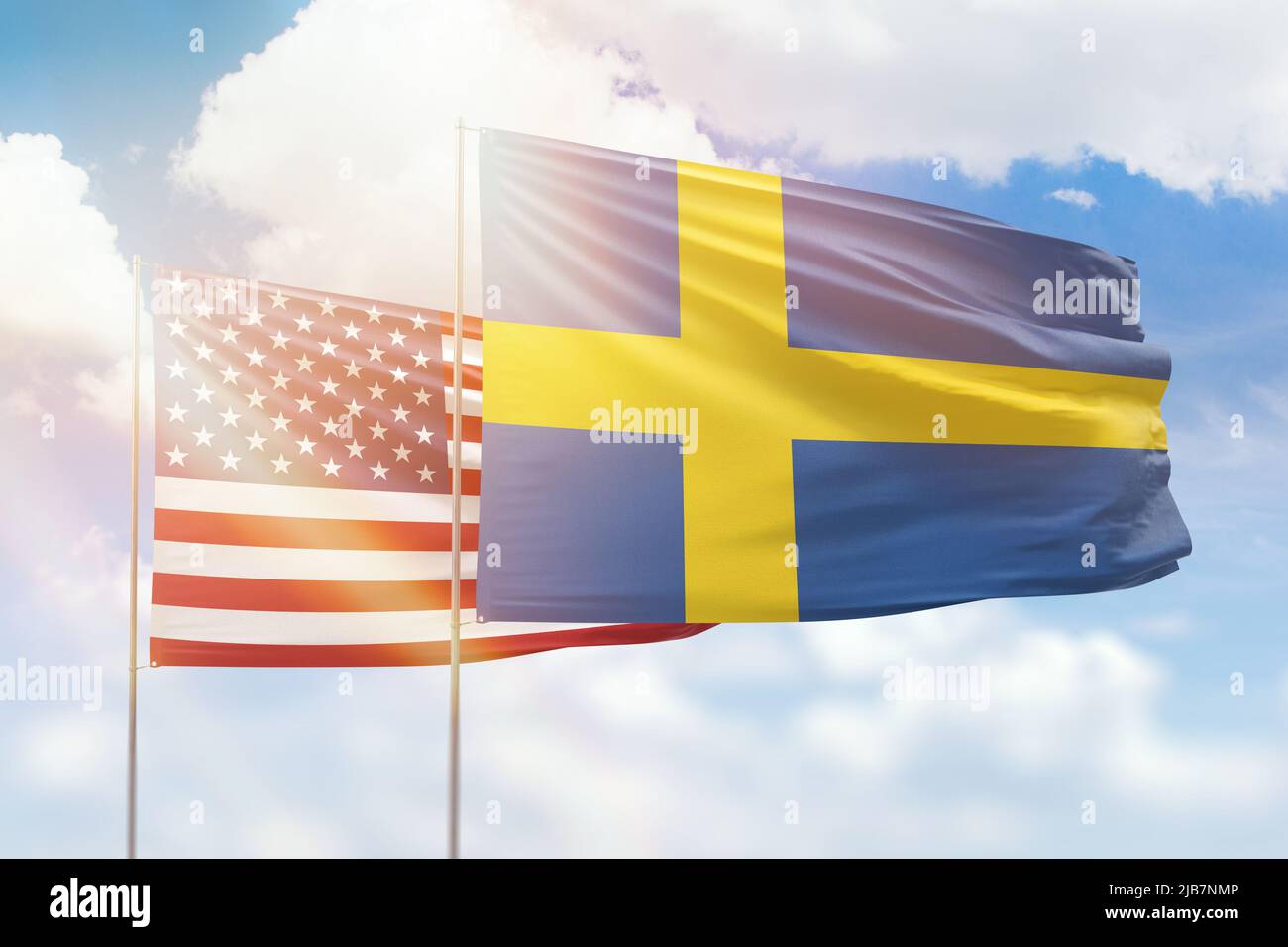 Sunny blue sky and flags of sweden and usa Stock Photo - Alamy