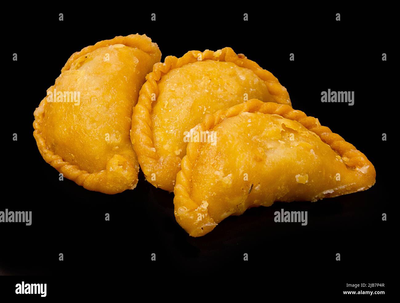 Indian dish - Gujiya Stock Photo - Alamy