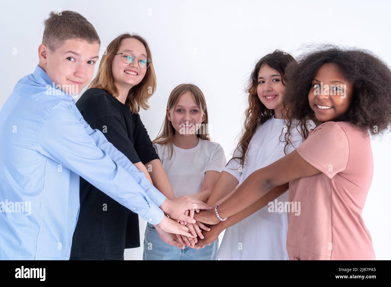 Group Of Teens Holding Hands