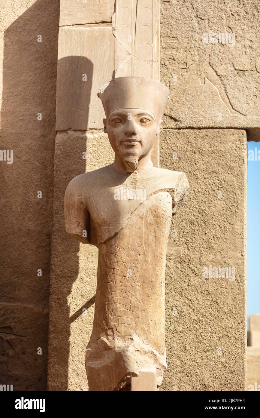 Statues of ancient Egyptian pharaohs and gods. Various hieroglyphs on ...