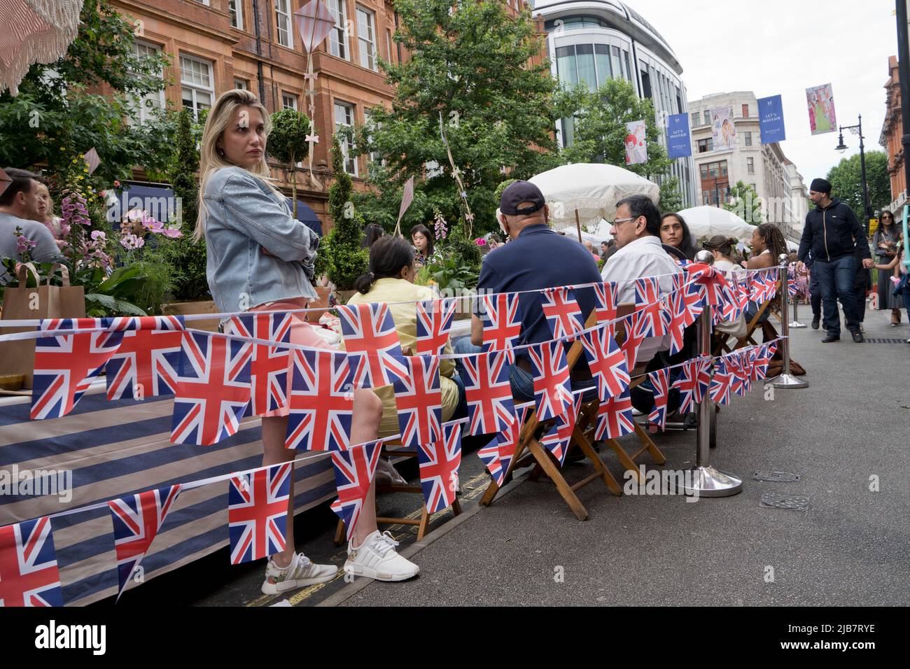 Visitors at a street party to commemorate Queen Elizabeth II 70th year ...