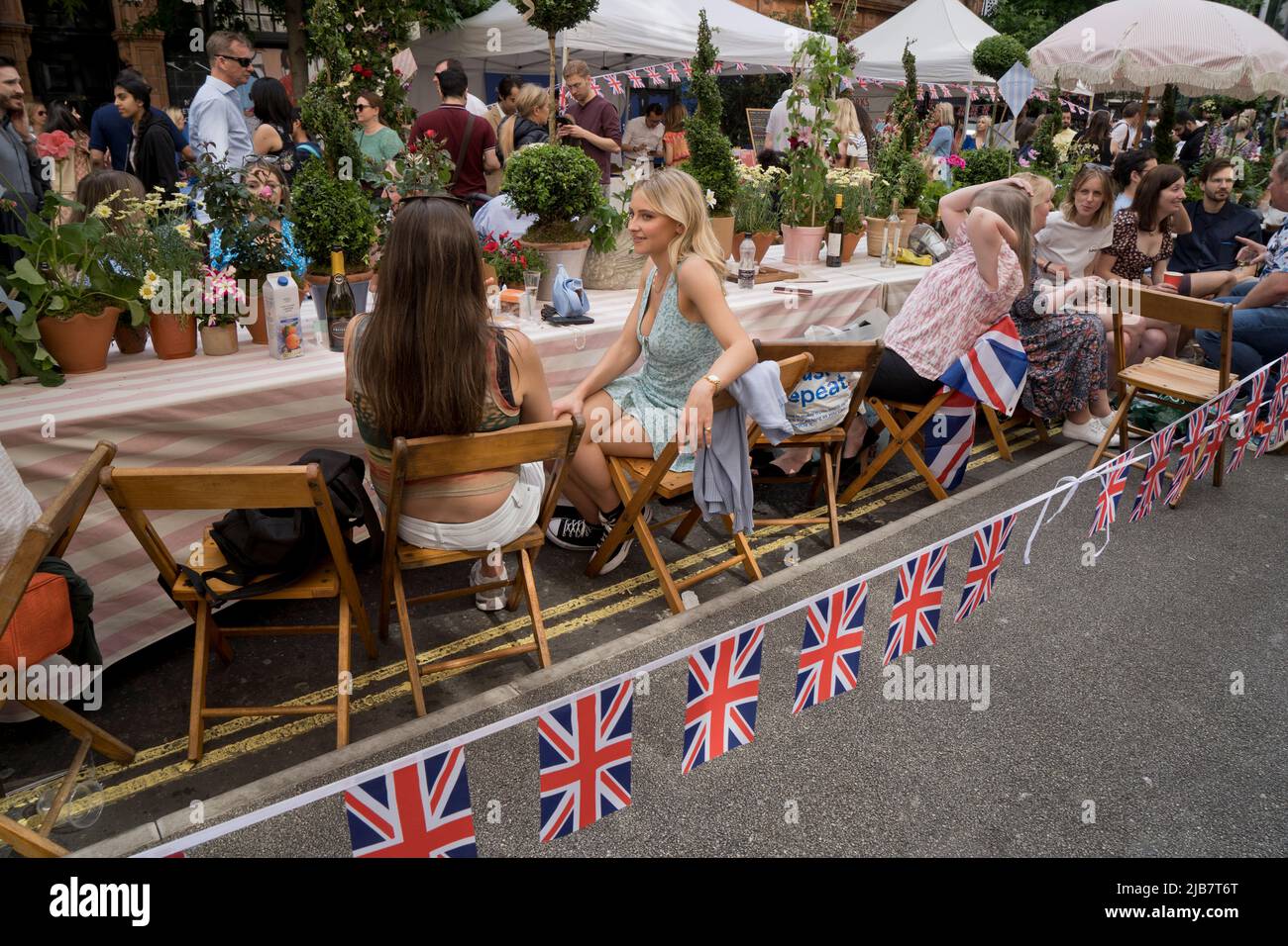 Visitors at a street party to commemorate Queen Elizabeth II 70th year ...