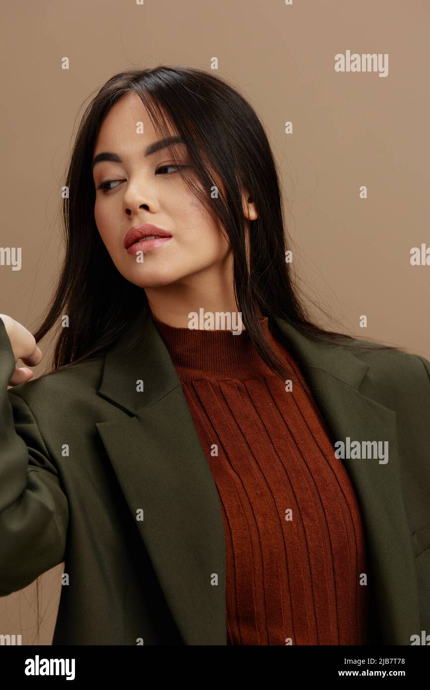 pretty woman in a stylish suit in attractive look posing isolated ...
