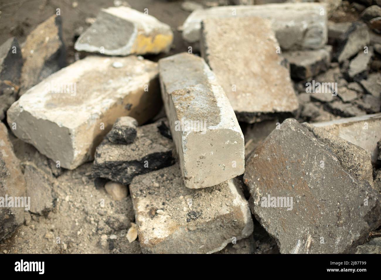 Broken concrete slabs. Lots of stones. Construction waste. Details of ...