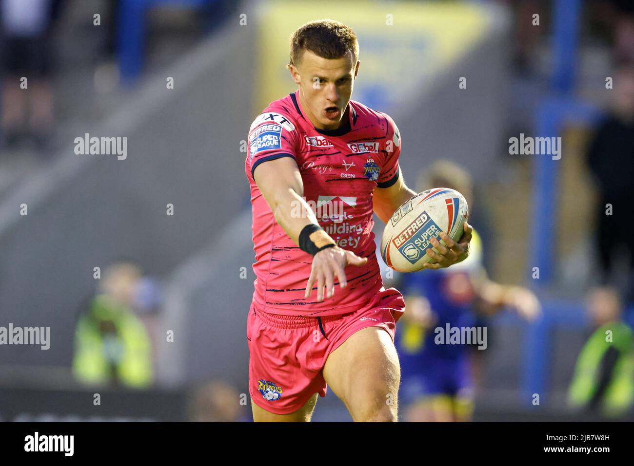 Leeds Rhinos' Ash Handley celebrates scoring his side's eight try of ...
