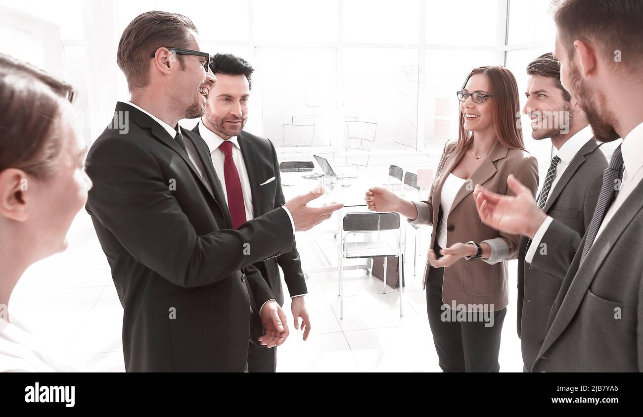 business woman talking to business partners in her office.photo with ...