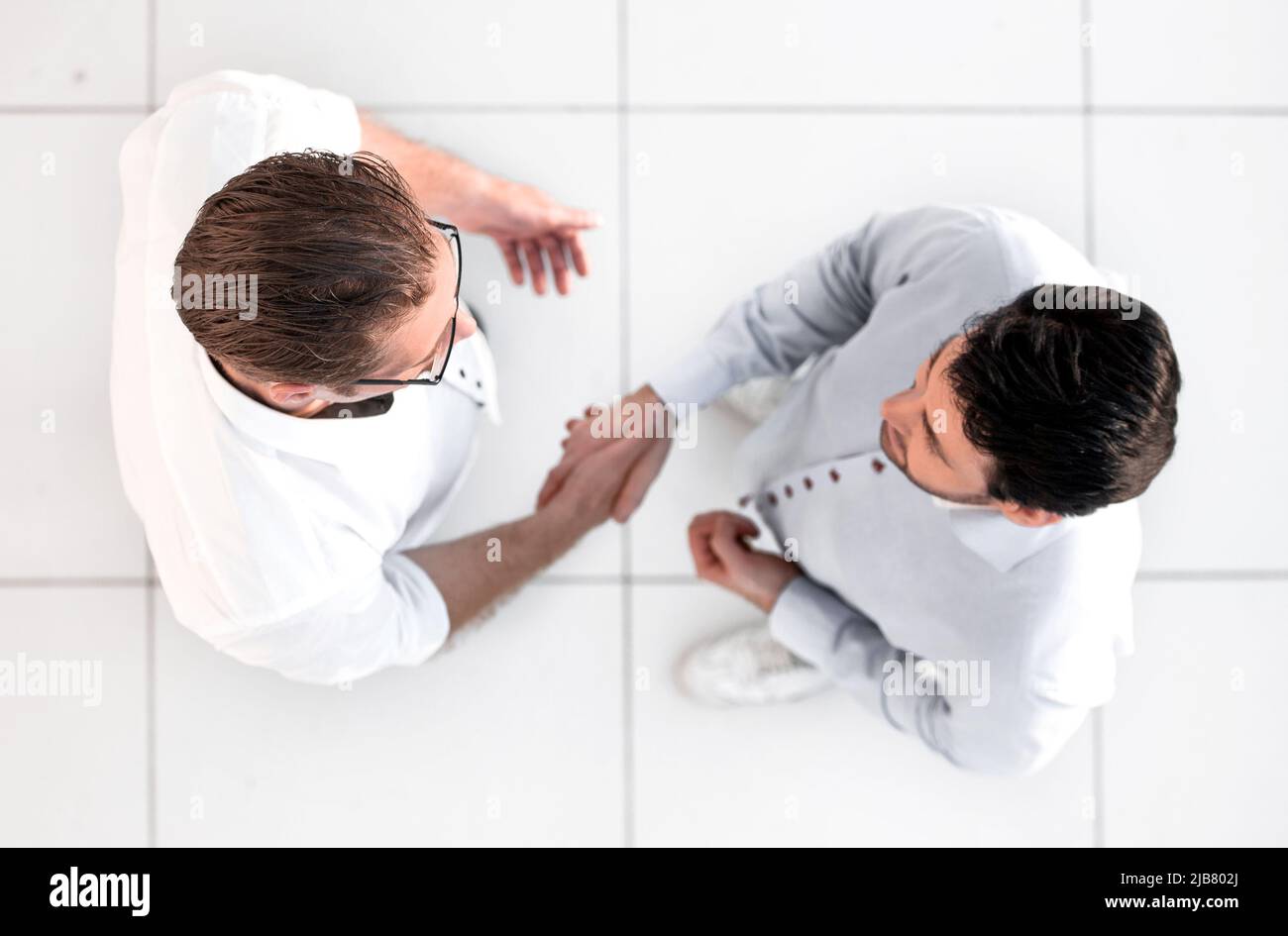 top view. handshake of modern business people Stock Photo - Alamy