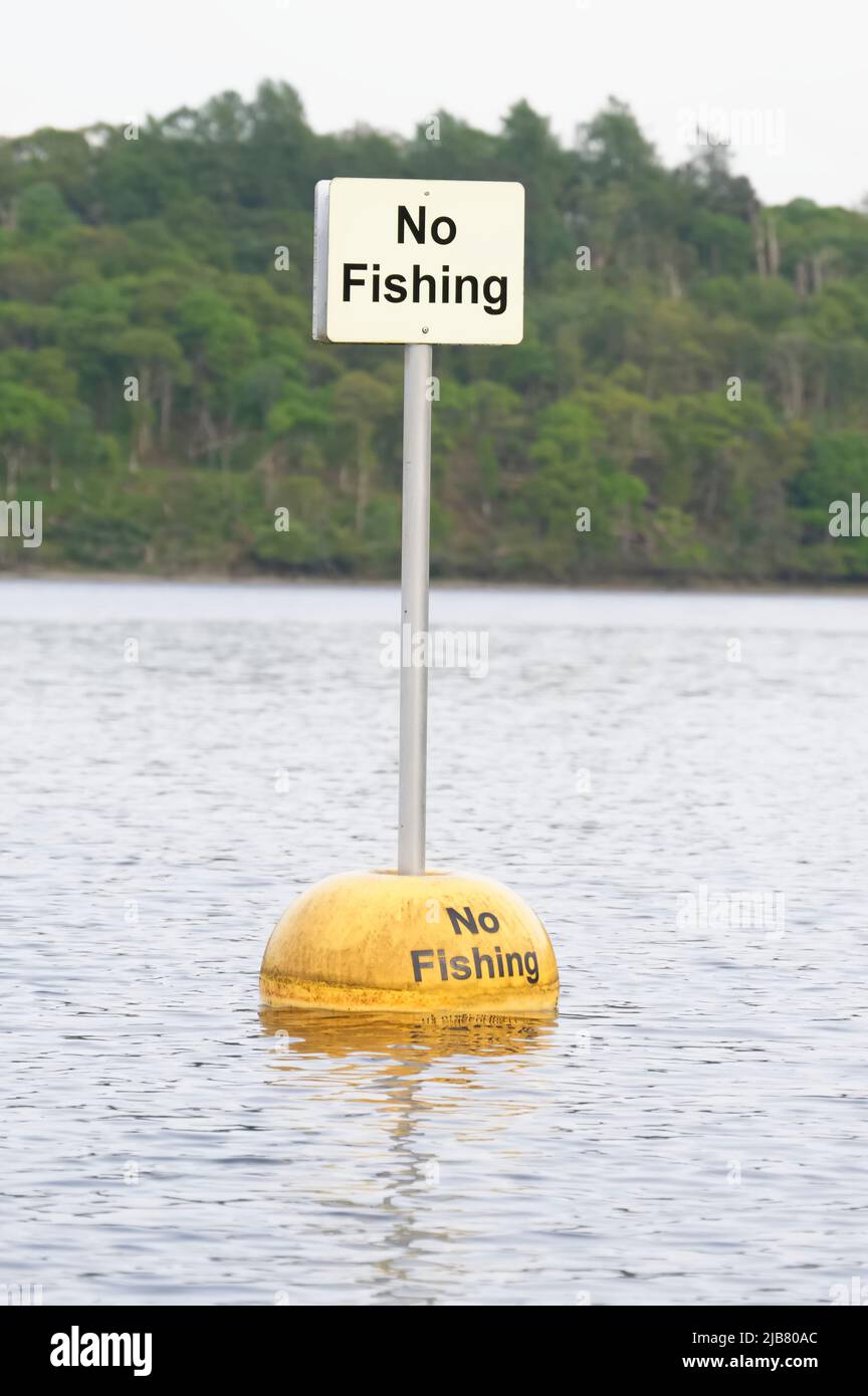 No fishing sign on float in Loch Lomond Stock Photo - Alamy
