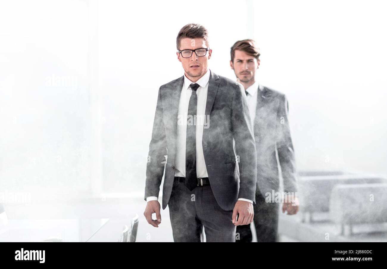 Businessman in office room smoke hi-res stock photography and images ...